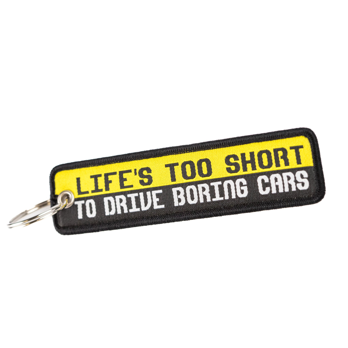 Life's Too Short To Drive Boring Cars - Keychain – The Official FNA Store